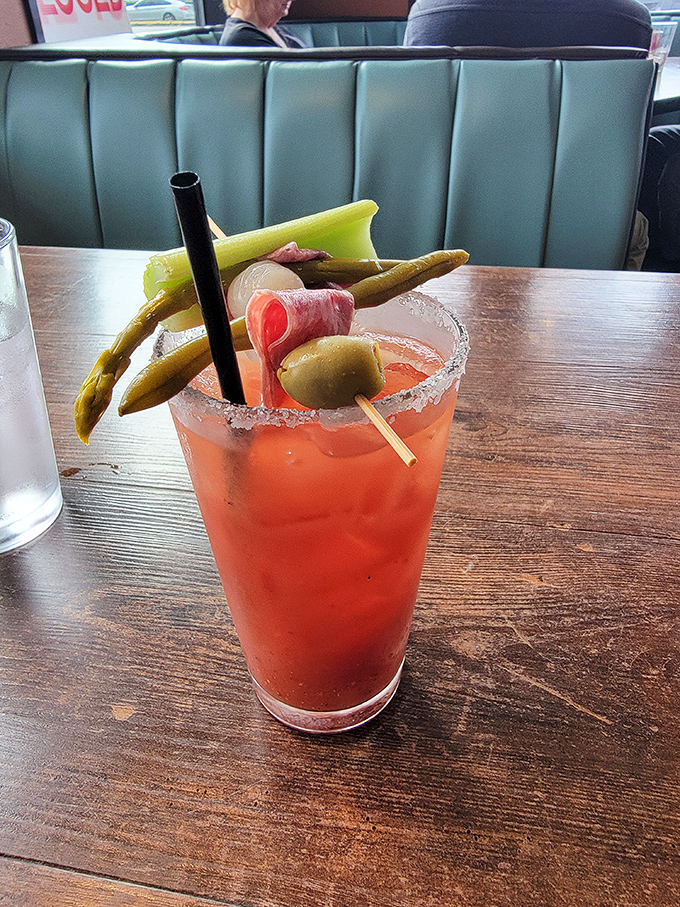 A Bloody Mary adorned like it's heading to a fancy cocktail party. That celery stalk is just the beginning of this drink's personality.