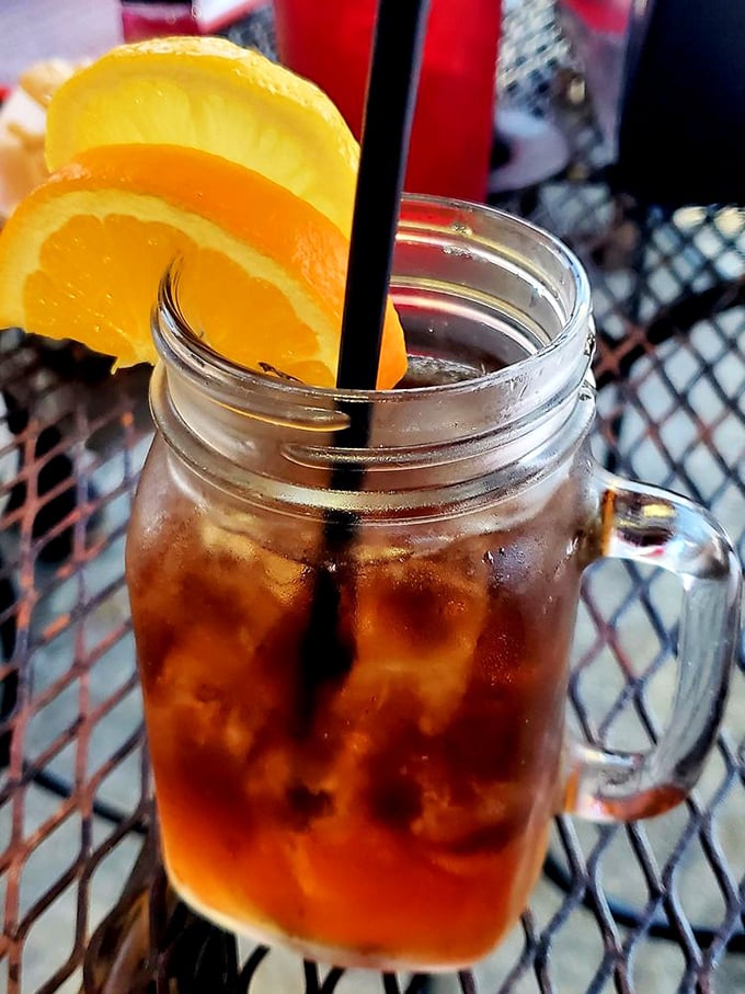 Sweet tea served in a mason jar with citrus garnish&mdash;the unofficial champagne of the South and perfect companion to spicy Cajun flavors.
