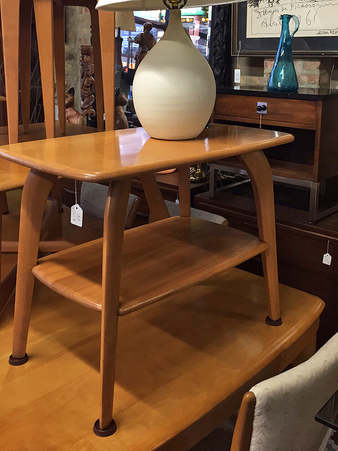 This three-tiered side table with tapered legs could tell stories of cocktail parties past. The perfect perch for your Old Fashioned.