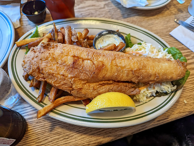 Fish and chips that would make a New Englander proud &ndash; crispy batter, flaky white fish, and fries that deserve their own fan club.