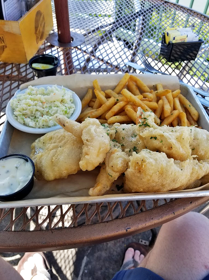 Fish and chips that would make a British pub jealous&mdash;light, crispy batter protecting tender fish, with fries and slaw playing perfect supporting roles.