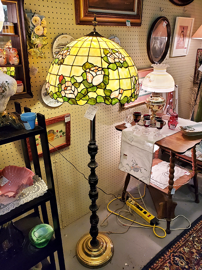 This stunning Tiffany-style floor lamp transforms any room into a warm sanctuary with its glowing floral pattern and classic craftsmanship.