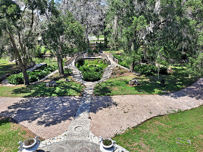 The formal garden's symmetrical pathways create a geometric masterpiece when viewed from above&mdash;proof that landscaping is an art form.