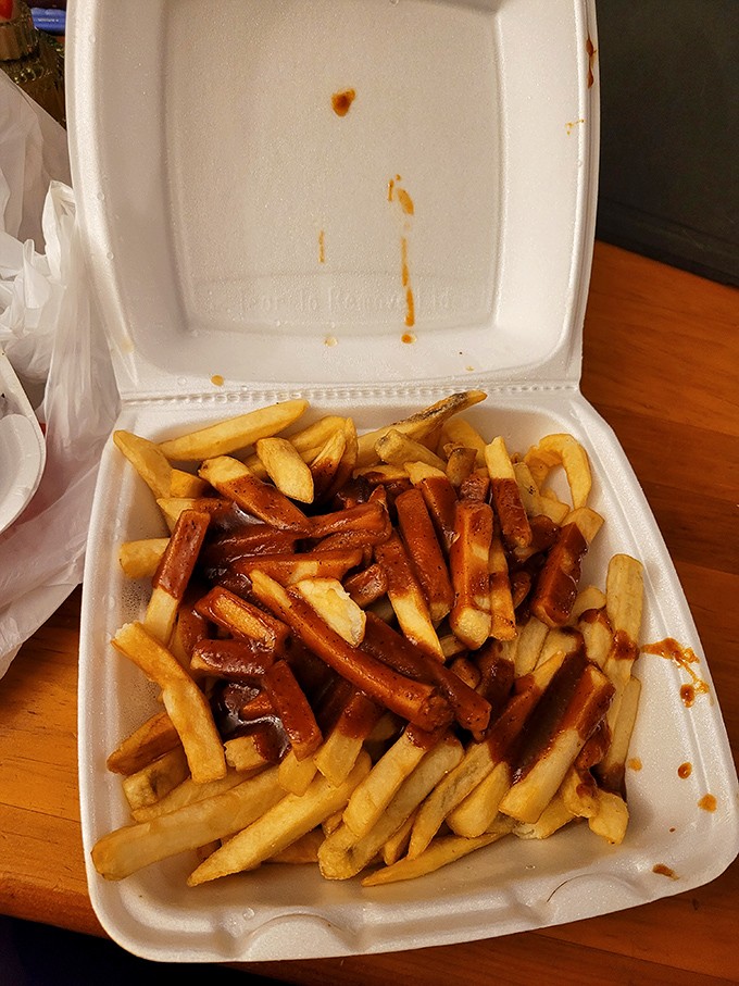 Fries drizzled with sauce&mdash;because in barbecue country, even the potatoes deserve a proper coating of that sweet, tangy nectar.
