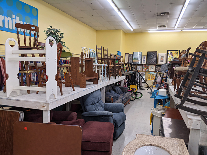 Furniture purgatory, where chairs, tables, and sofas wait for their second chance at domestic bliss. That blue armchair has stories to tell.