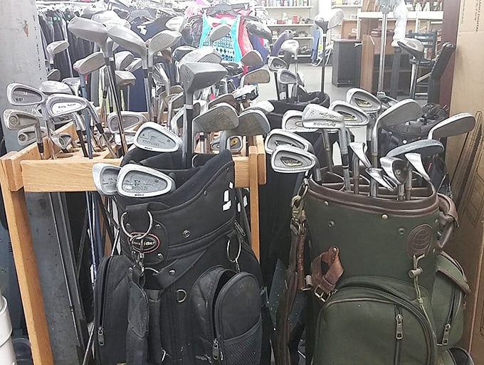 Golf clubs huddle together like old friends at the 19th hole, waiting for a new partner to take them out for another round.