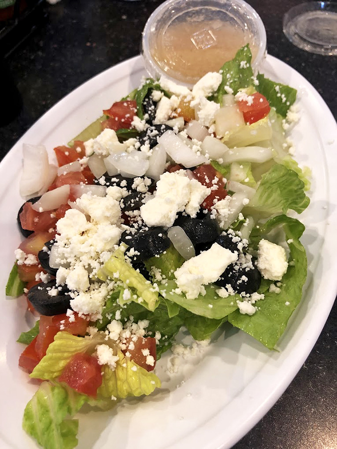 The Greek salad doesn't just have feta cheese&mdash;it has enough to make you wonder if there's a direct supply line from Athens.