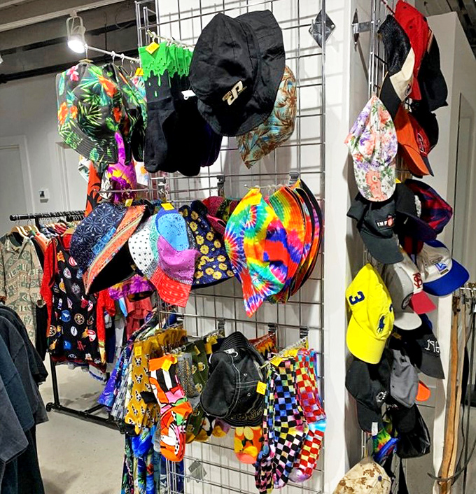 The hat display is a festival of personalities &ndash; from tie-dye bucket hats to structured caps, each one waiting to crown a new adventure.