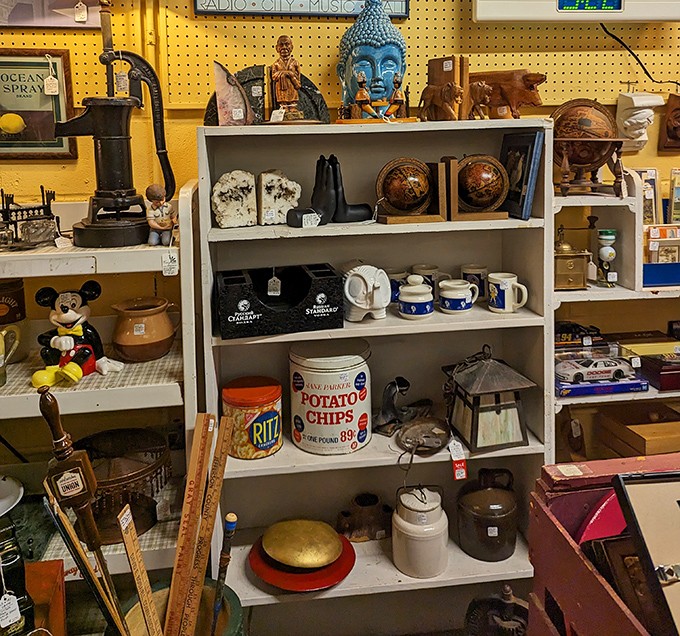 A perfectly curated corner office setup that Don Draper would approve of, complete with vintage globes and mid-century flair.