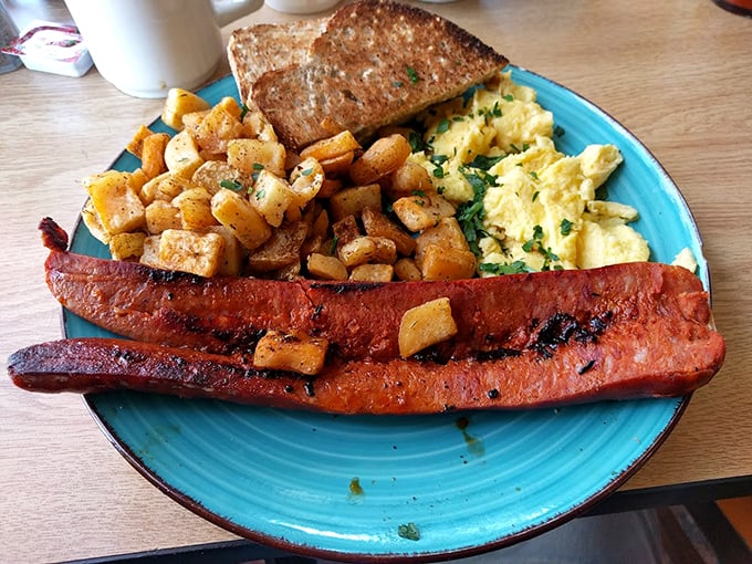 Breakfast potatoes that have achieved that mythical balance&mdash;crispy exterior, fluffy interior&mdash;alongside eggs and sausage that clearly went to breakfast charm school.