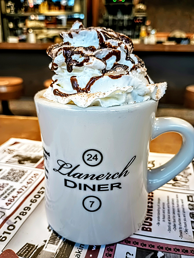 Hot chocolate that's basically dessert in a mug. That whipped cream mountain needs its own zip code.