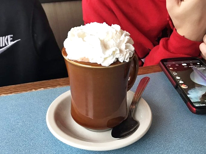 Hot chocolate that understands its purpose in life isn't just to warm you up, but to create a moment of whipped cream-topped bliss.