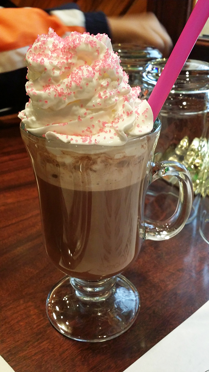 Hot chocolate that's dressed for a special occasion, complete with whipped cream mountain and sprinkles. Dessert masquerading as a beverage.