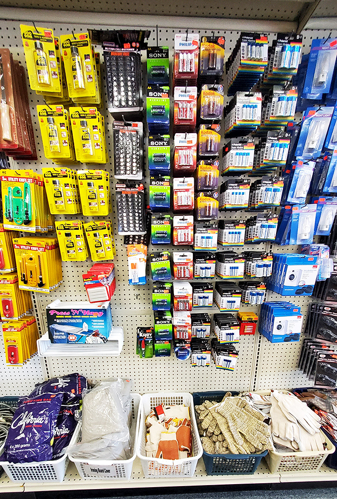 Brand-name batteries and household essentials lined up like soldiers ready to rescue your remote controls and flashlights from power emergencies.