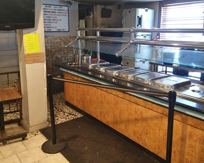 The serving line where BBQ dreams come true. Simple, efficient, and focused on getting that smoky goodness to your table.