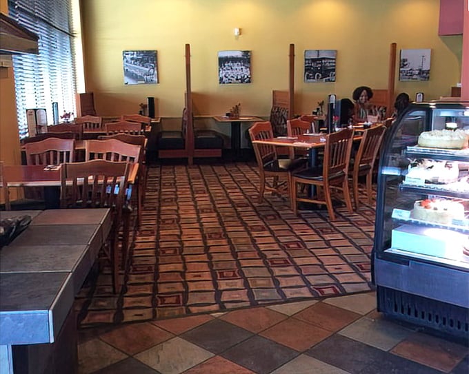 Warm yellow walls, wooden chairs, and black-and-white photos create that "everybody knows your name" vibe that makes regulars out of first-timers.