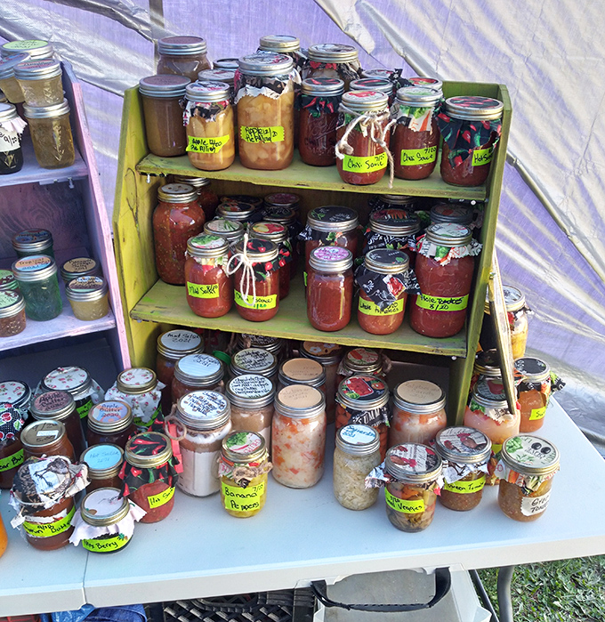 Mason jar magic! Homemade preserves in every hue showcase Missouri's harvest bounty &ndash; each jar a sweet or savory time capsule of seasonal flavors.