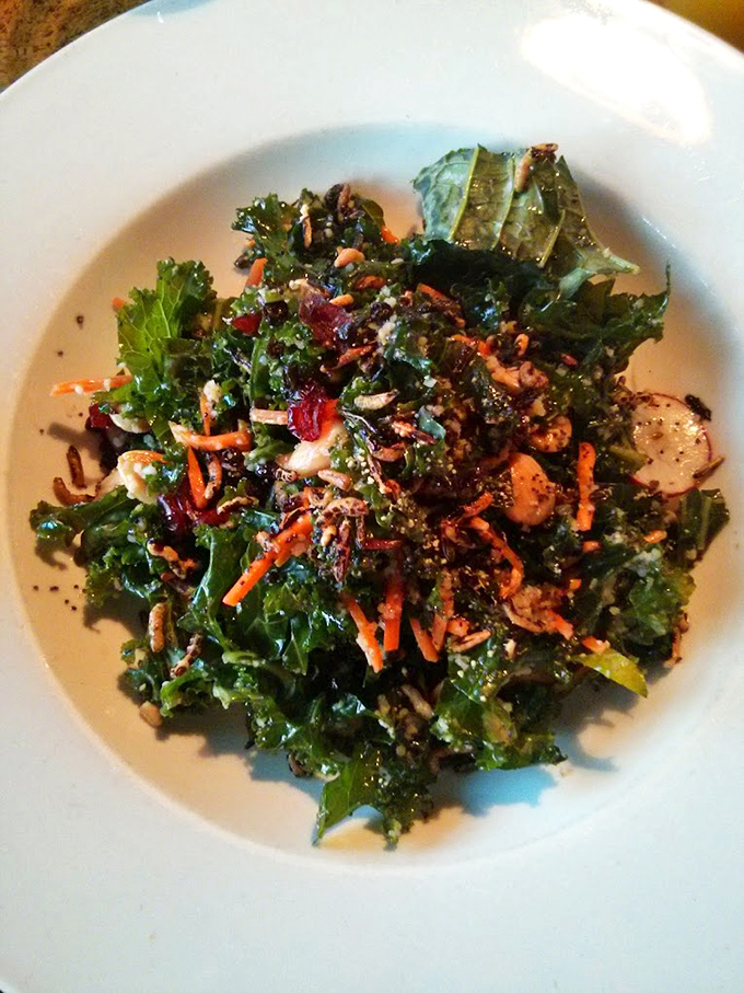 A kale salad that could convert even the most dedicated carnivore. Those vibrant colors aren't just Instagram-worthy &ndash; they're nutrient-packed deliciousness.