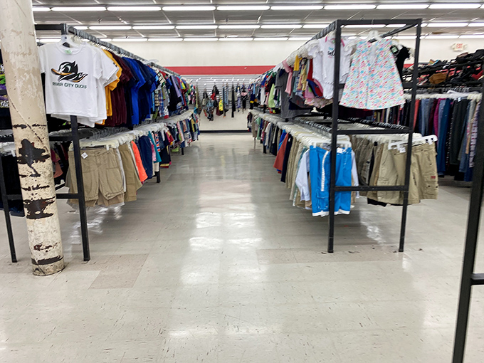 Aisles of possibility where children's clothes await new adventures&mdash;each tiny garment already softened by the magic ingredient no detergent can replicate: time.