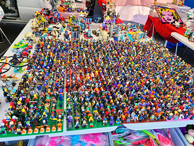 A miniature army of LEGO figures stands at attention, each tiny plastic face holding stories and adventures waiting to be reimagined.