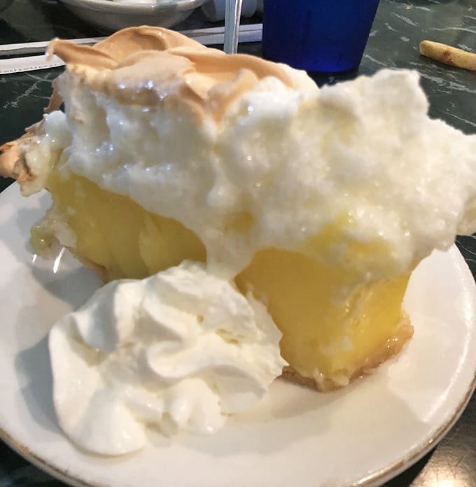 The towering lemon meringue pie performs the perfect balancing act &ndash; tart filling, cloud-like meringue, and just enough sweetness.