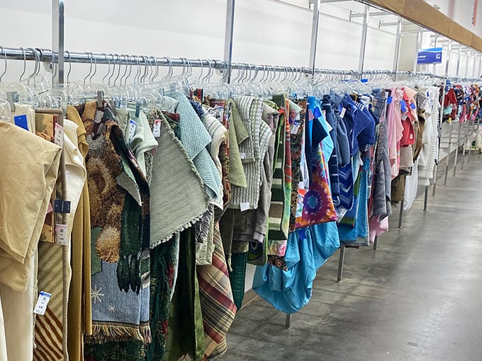 Fabric treasures hanging in patient rows. Someone's abandoned curtain project could become your statement tablecloth with just a little imagination.