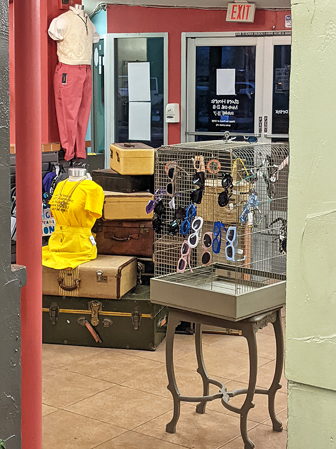 Vintage suitcases stacked like a time-traveling tower, topped with sunglasses that have seen decades of Arizona sunshine through different eyes.