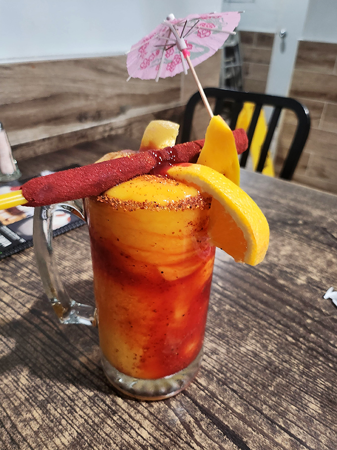 The mangonada&mdash;part drink, part dessert, all spectacular. That little umbrella isn't for rain; it's shading perfection from the Arizona sun.