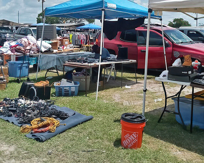 Weekend entrepreneurs in their natural habitat. The market's impromptu layout creates neighborhoods of merchandise where browsing becomes an adventure.