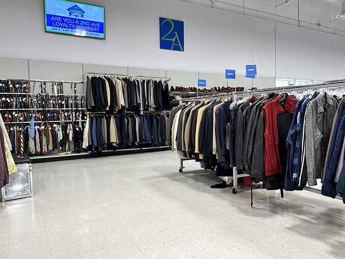 The men's department stands ready for business, where vintage suits and modern casual wear coexist in perfect harmony.