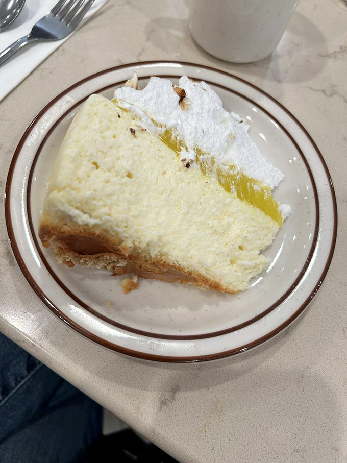 Cheesecake that defies gravity with its cloud-like texture. The graham cracker crust provides the perfect foundation for this slice of heaven.