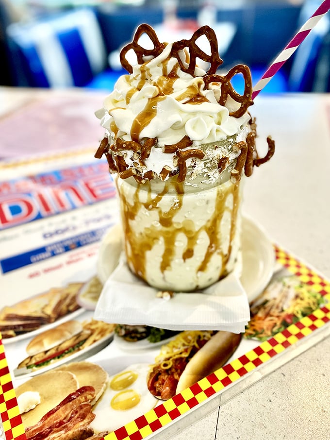 Not just a milkshake but a structural engineering marvel of pretzels, whipped cream, and caramel that demands respect.