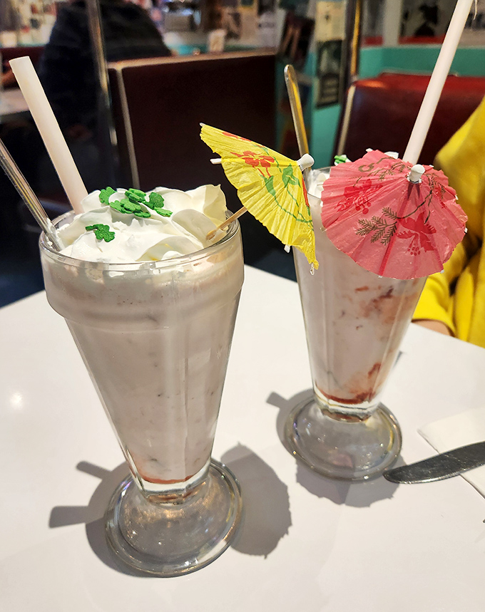 These milkshakes come dressed for the party with paper umbrellas &ndash; because happiness needs proper accessories.