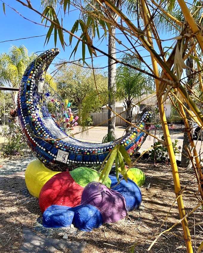 This mosaic moon cradles colorful cushions like it's hosting a celestial slumber party. Dreamcatchers must get their supplies here.