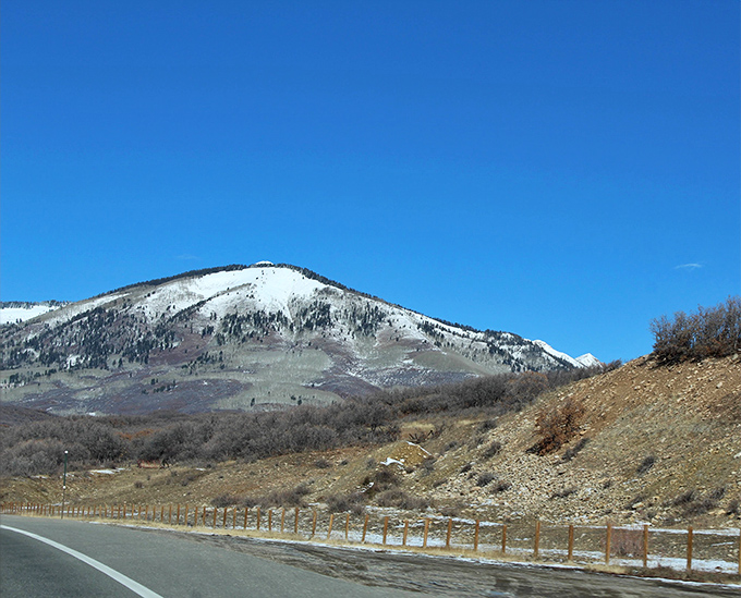 Winter dusts the mountains surrounding Trinidad with snow, creating a postcard-perfect backdrop for your Colorado adventure.