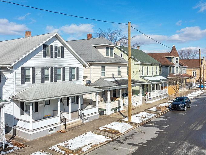 Modest, well-maintained homes line this residential street, representing the affordable housing that makes Sunbury a retirement haven where Social Security checks stretch remarkably far.