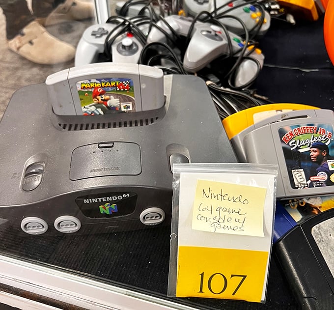 Nintendo 64 with Mario Kart? Childhood nostalgia priced less than downloading the app version. Gaming history preserved one cartridge at a time.