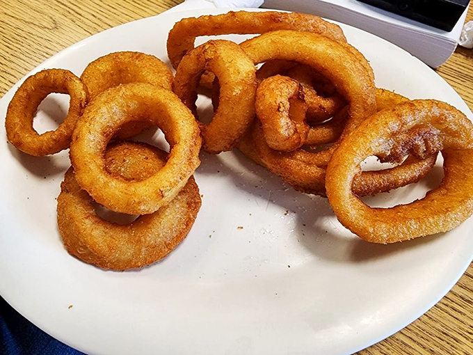 These onion rings aren't just fried&mdash;they're golden halos of crispiness that make you believe in deep-fried divinity.