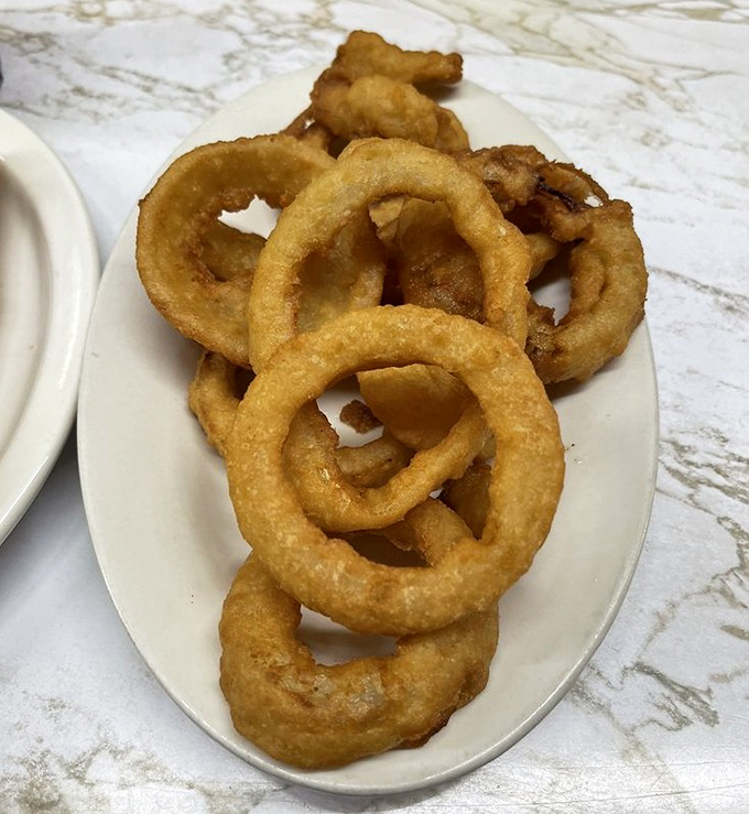 Onion rings that achieve that perfect balance&mdash;crisp enough to make a satisfying crunch, yet tender enough inside to remind you why simple pleasures endure.
