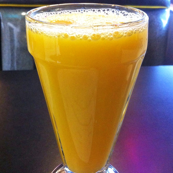Morning sunshine in a glass! This fresh-squeezed orange juice has more vitamin C than a pharmacy and twice the flavor of anything from a carton.