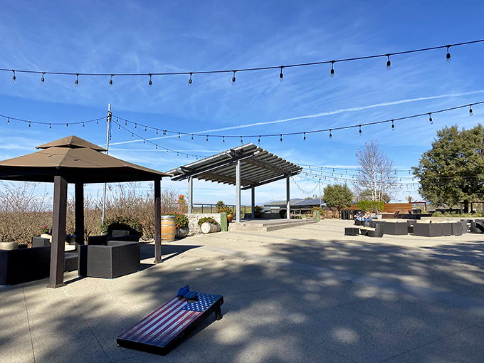 String lights hover above this outdoor gathering space&mdash;ready to illuminate evening revelry under Temecula's star-studded sky.