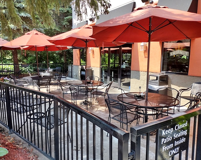 Minnesota's brief but glorious patio season comes alive at Carol's outdoor seating area, where comfort food tastes even better under those cheerful orange umbrellas.