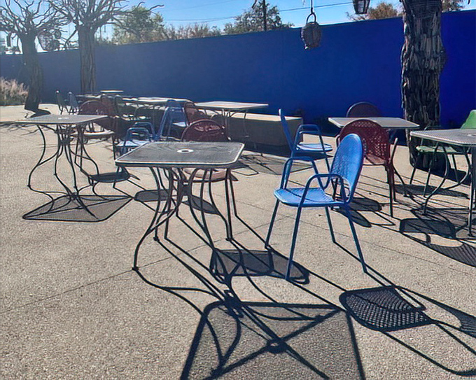 The outdoor patio offers a sun-drenched escape where every table casts artistic shadows&mdash;the perfect stage for the flavor drama about to unfold on your plate.