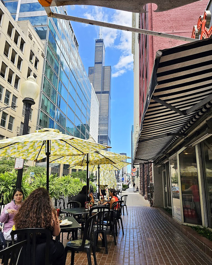 From Lou Mitchell's doorstep, you can see the Willis Tower standing tall, as if keeping watch over Chicago's breakfast traditions.