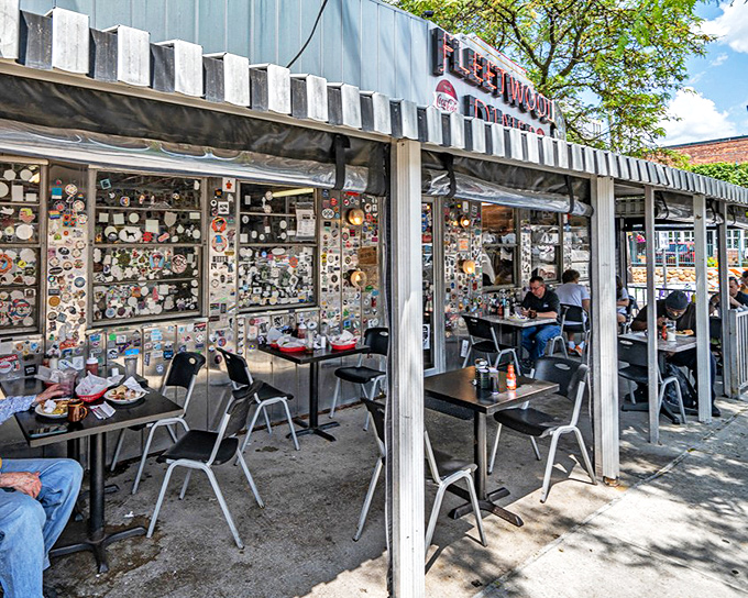 The outdoor patio buzzes with conversation and clinking silverware. Where town meets gown and everyone speaks the universal language of "pass the ketchup."