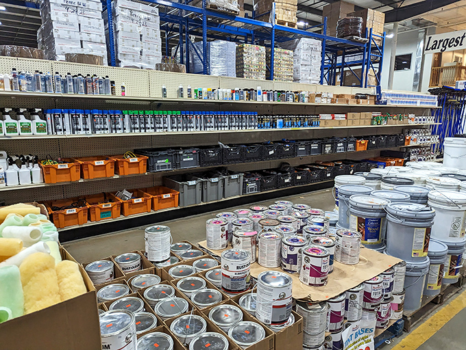 Paint paradise for the home improvement enthusiast. Those stacked buckets contain more than color&mdash;they hold the potential for transformation at bargain basement prices.