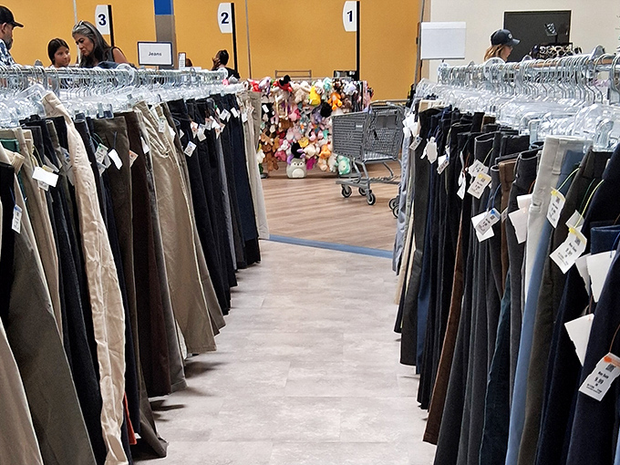 The pants section offers a denim democracy where designer labels mingle with everyday brands, all waiting for their second chance at fashion greatness.