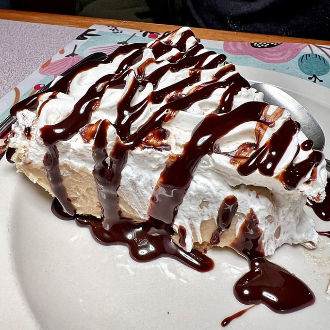 A slice of heaven with chocolate drizzle. This pie doesn't need social media validation&mdash;it's been collecting real-life likes since before the internet existed.