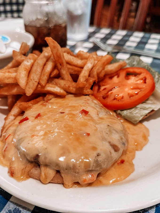 That's not just a burger &ndash; it's a Southern masterpiece with melty pimento cheese cascading down the sides like delicious lava.