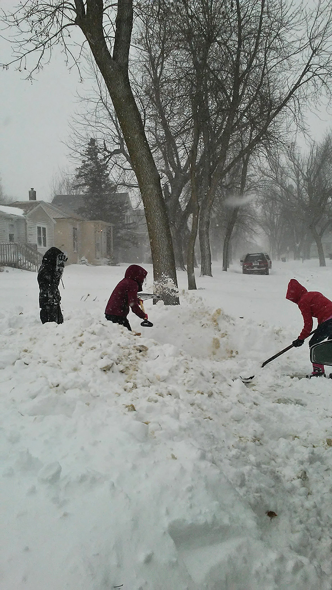 Minnesota winters build character and snowmen in equal measure, as local children demonstrate the art of turning blizzards into playtime.